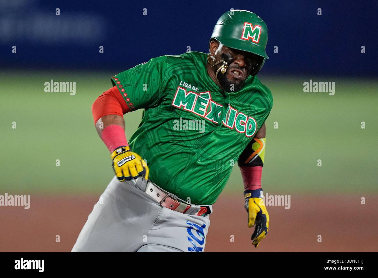 Mexico Green's Yadir Drake runs home to score against Mexico Red during ...