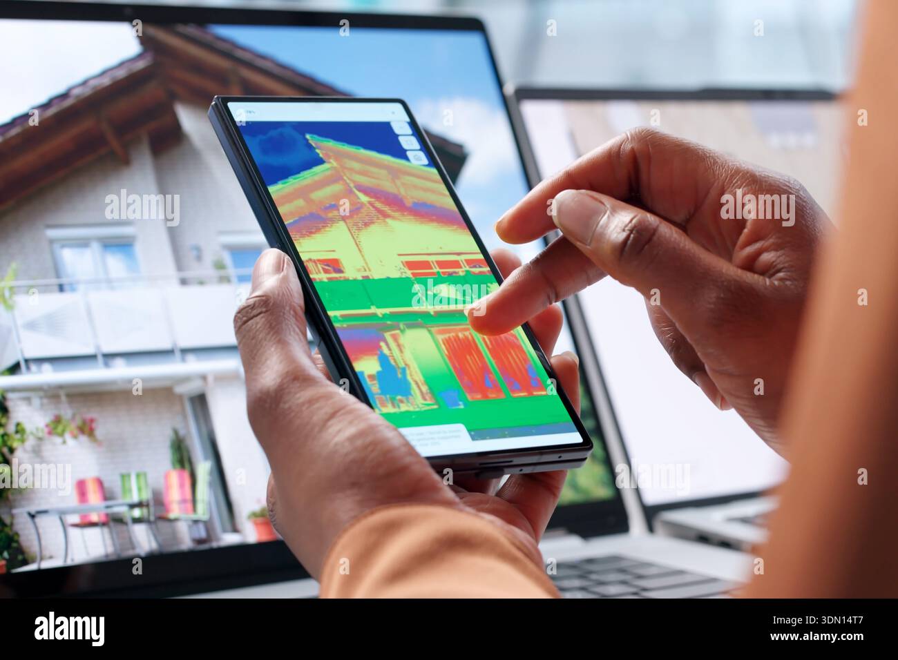 Woman Checking House Insulation Using Thermal Imaging On Her Phone ...