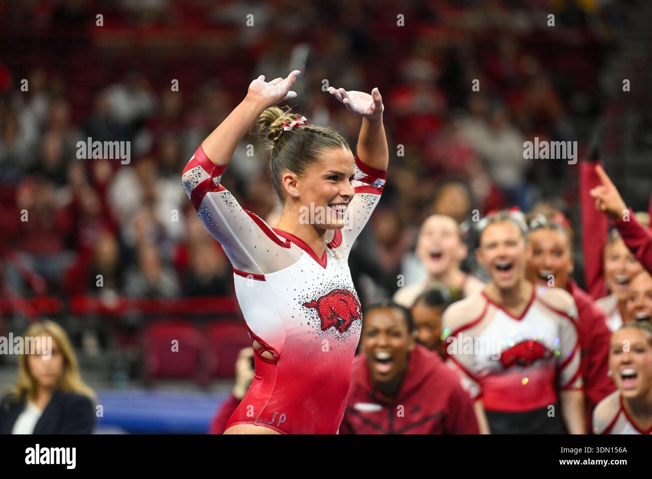 Arkansas gymnast Cami Weaver competes on the beam during an NCAA ...
