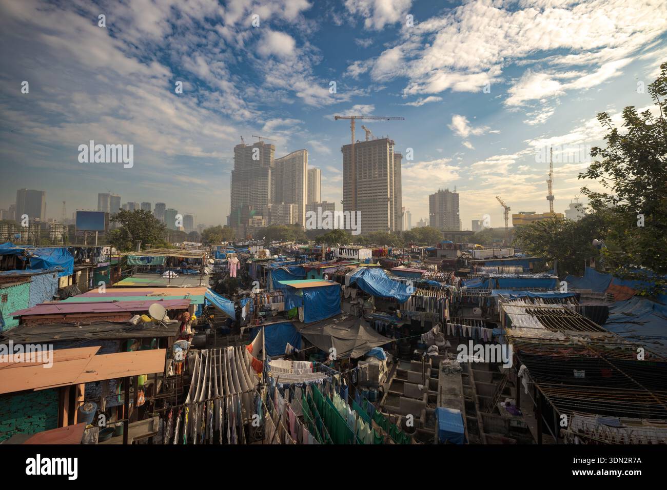 Traditional open air Dhobi Ghat laundry with colorful drying clothes ...