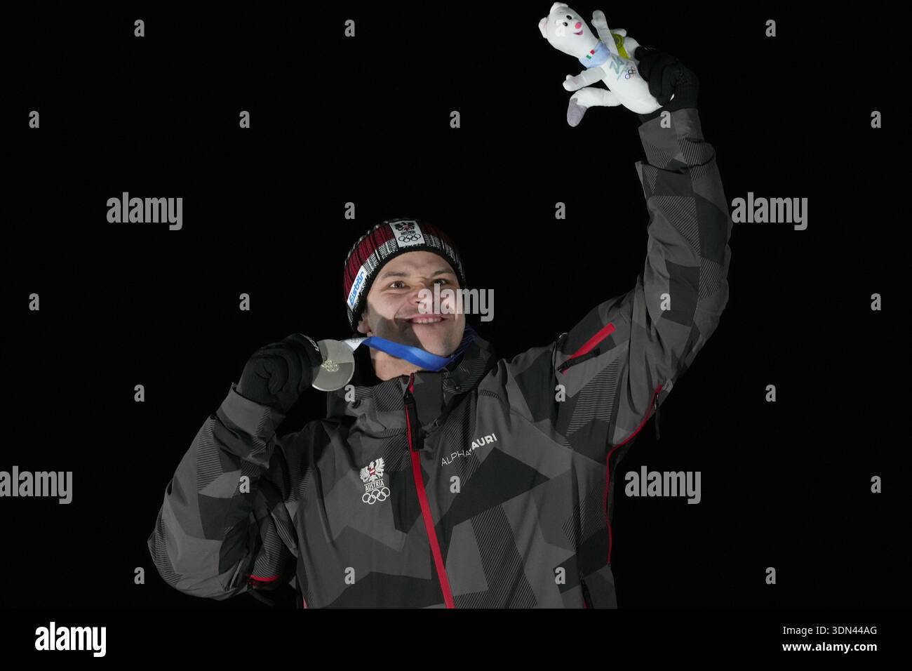 Second placed Austria's Jonas Mueller pose with his medal after the men ...