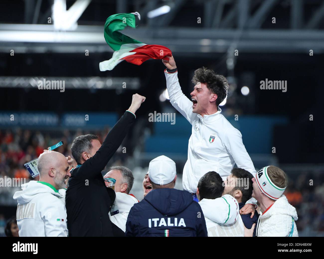 Milan, Italy. 8th Feb, 2026. Riccardo Lorello (top) of Italy celebrates ...