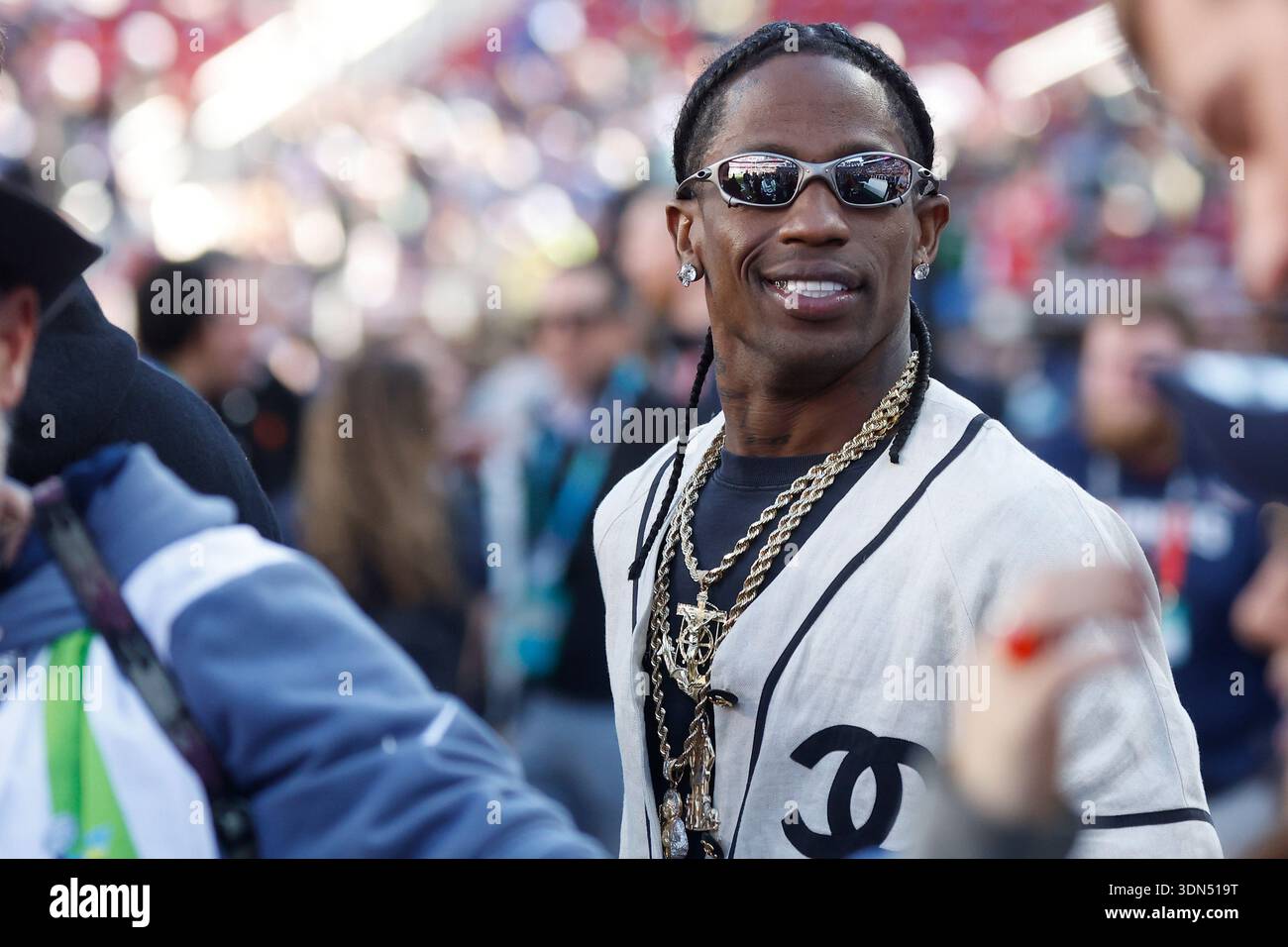 Rapper Travis Scott on the field before the start of Super Bowl LX at ...