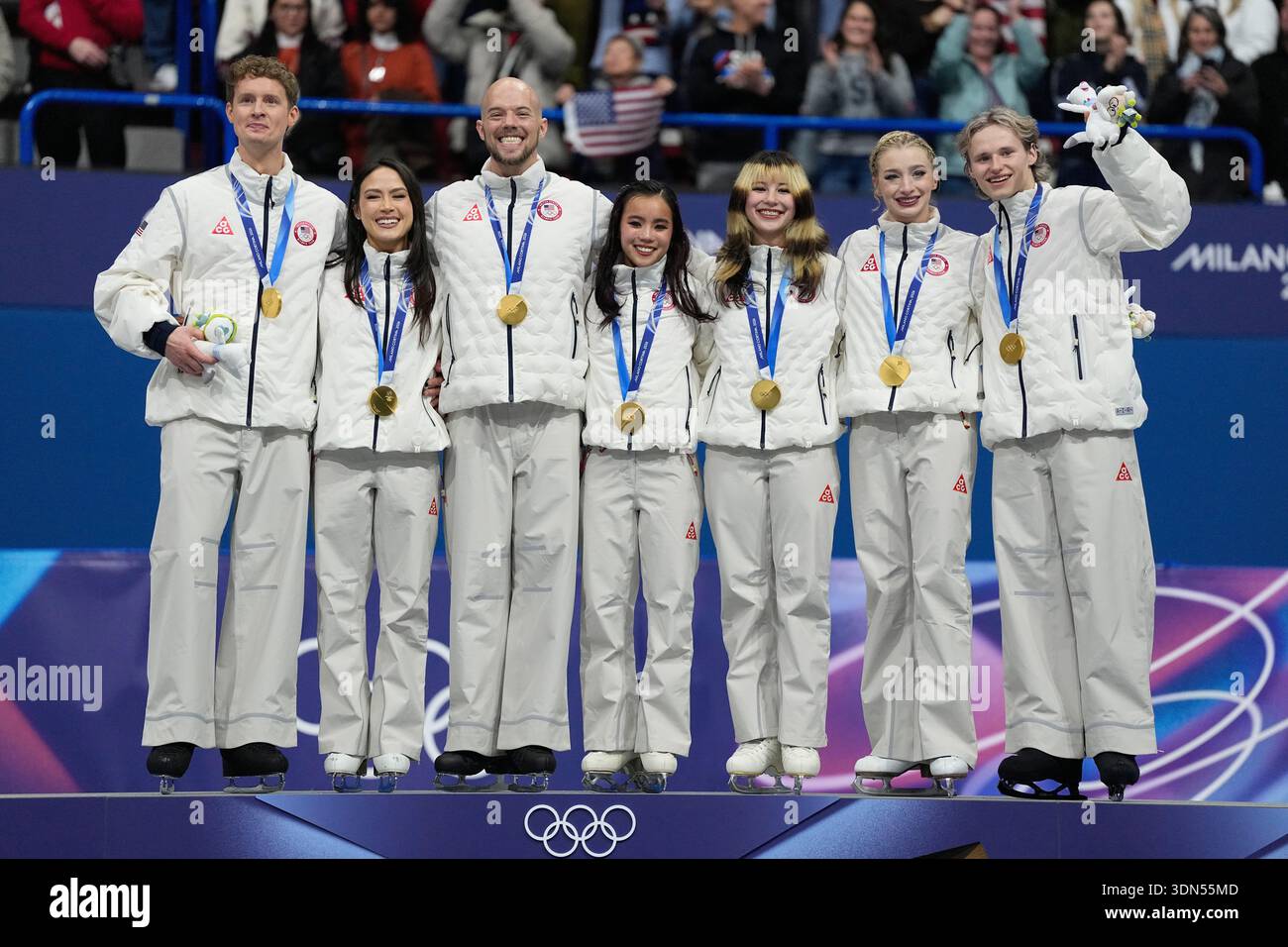 Team USA pose with their gold medals after the figure skating team ...