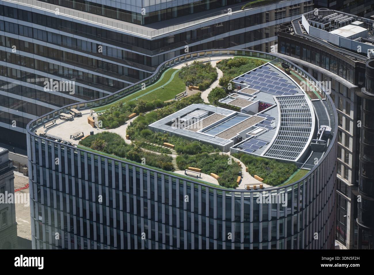 Modern building with green roof and solar panels seen from Sky Gardens ...
