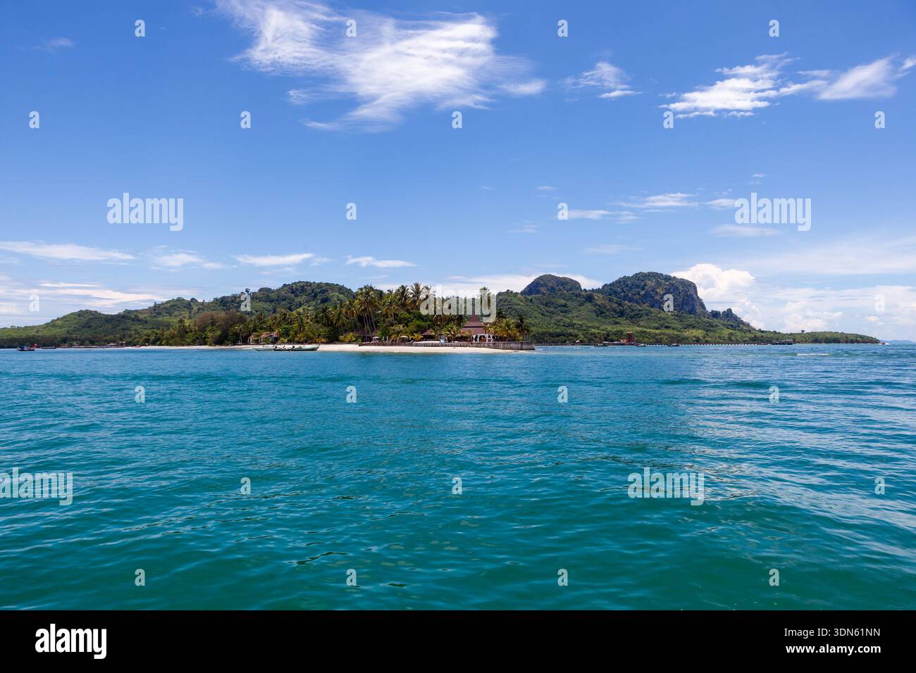 Tropical island of Koh Muk in Thailand with lush greenery and clear ...