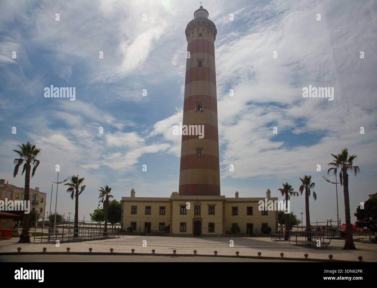 The Farol da Barra do Aveiro historic lighthouse at the Atlantic ocean ...