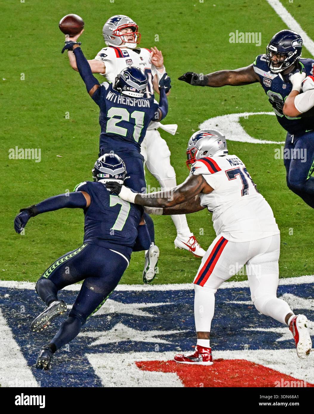 Seattle Seahawks cornerback Devon Witherspoon (21) forces New England ...