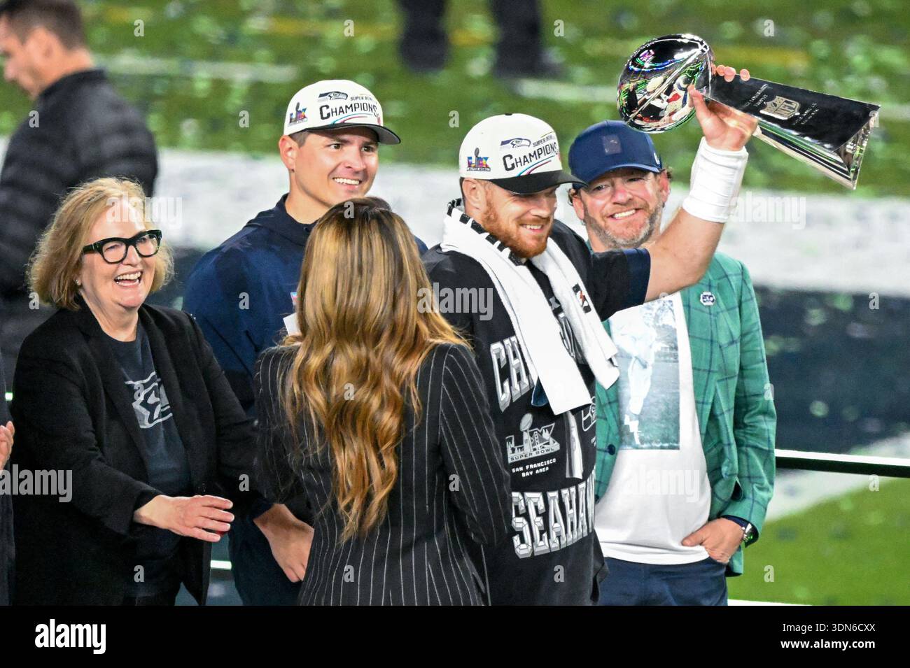 Seattle Seahawks quarterback Sam Darnold (14) holds the Vince Lombardi ...