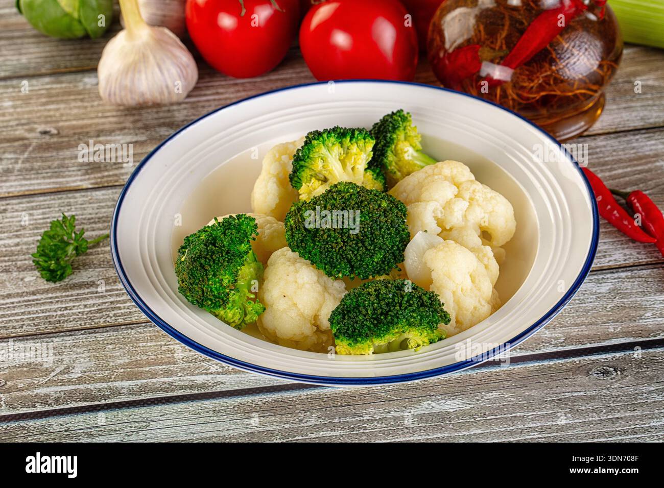 Vegan cuisine Steamed cauliflower and broccoli cabbage garnish Stock ...