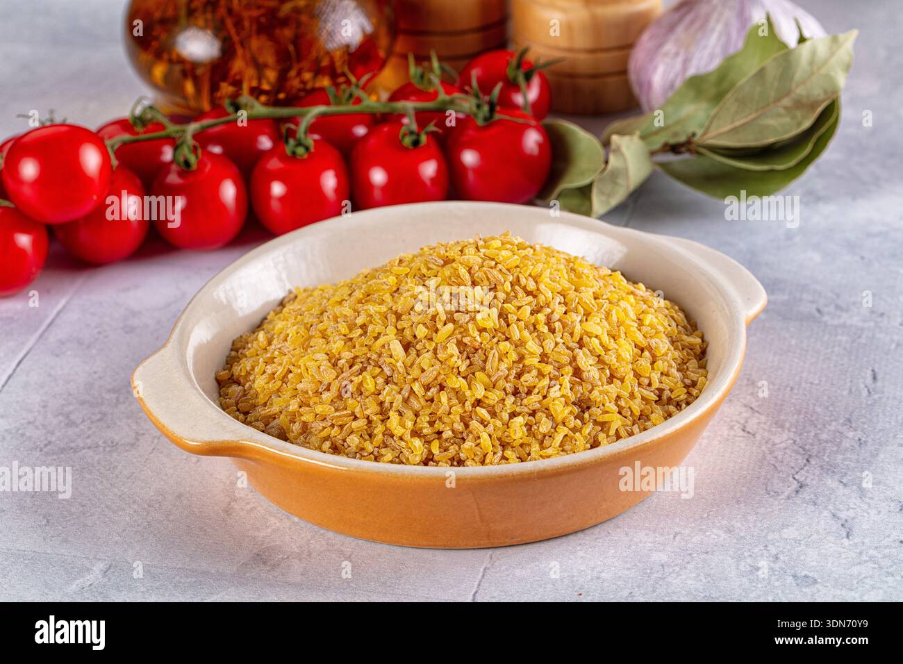 Raw dry bulgur wheat cereal for cooking Stock Photo - Alamy