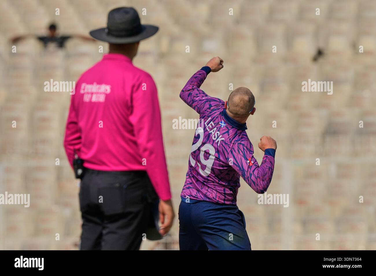 Scotland's Michael Leask celebrates the wicket of Italy's Gian Piero ...