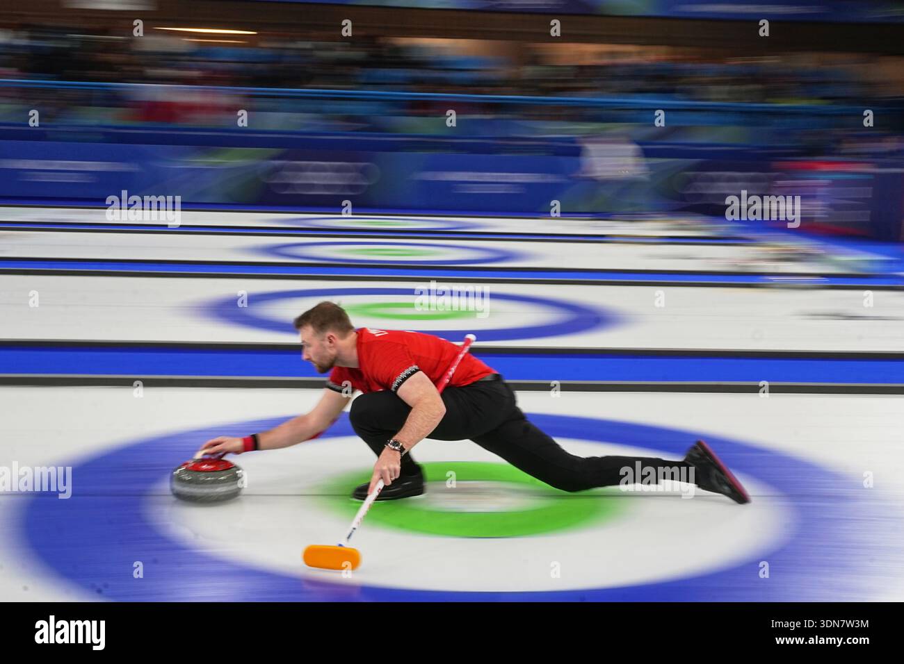 Switzerland's Yannick Schwaller in action during the mixed doubles ...