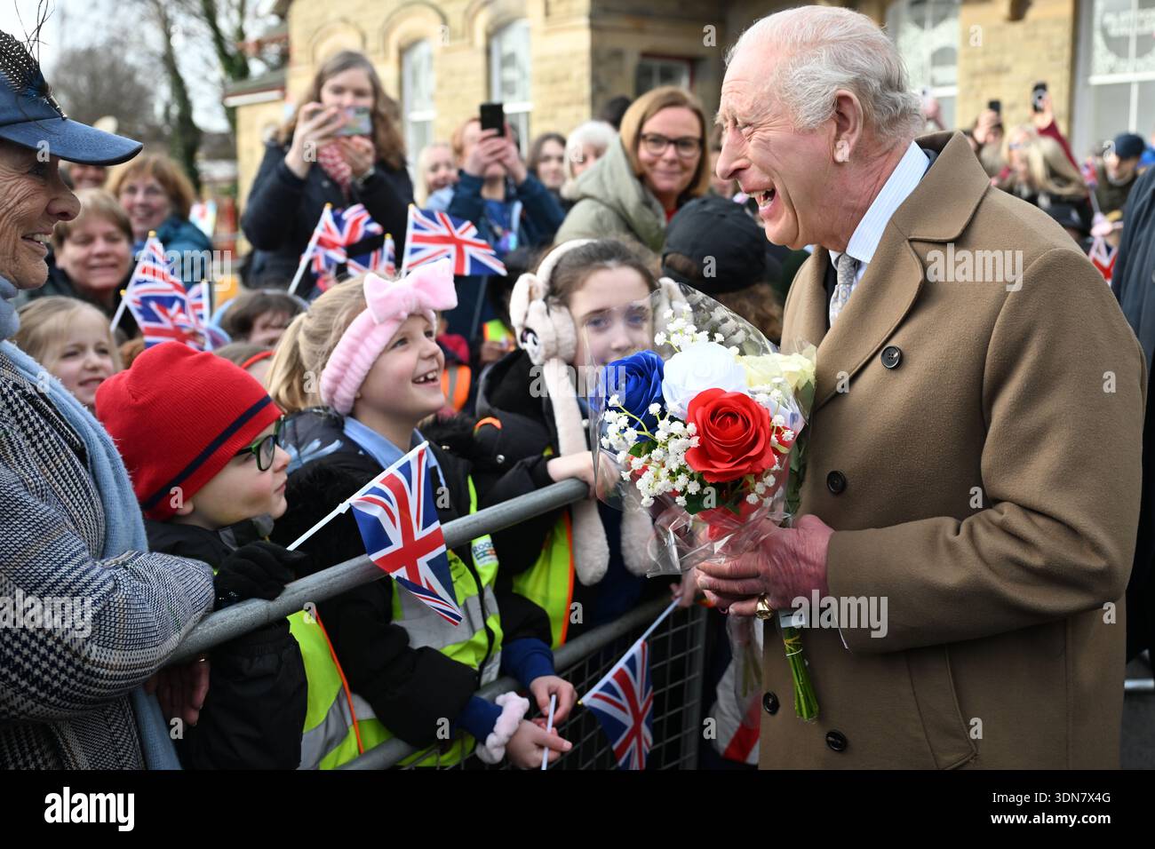 Britain's King Charles III greets the public outside Clitheroe Station ...