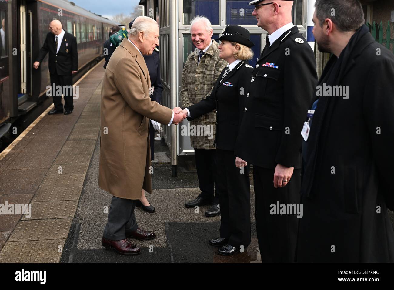 Britain's King Charles III shakes hands with Chief Constable of ...