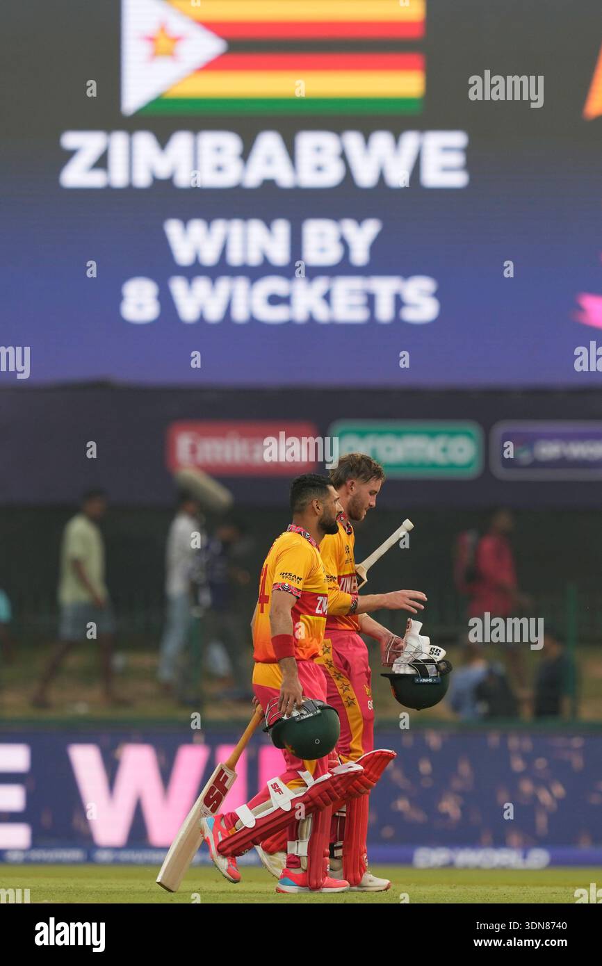 Zimbabwe's captain Sikandar Raza, left, Brian Bennett walks after their ...