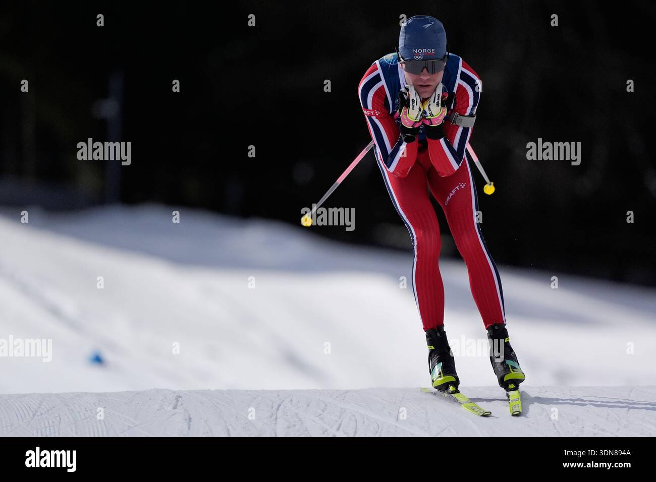 Martin Uldal, of Norway, skis during a biathlon training session at the ...