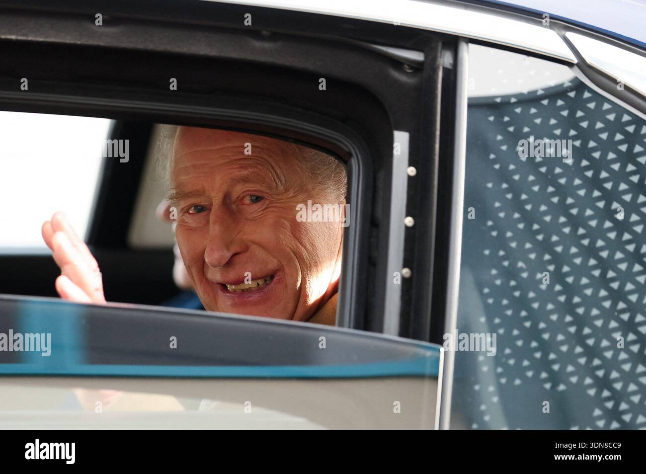 King Charles III waves following his visit to Clitheroe Auction Mart in ...