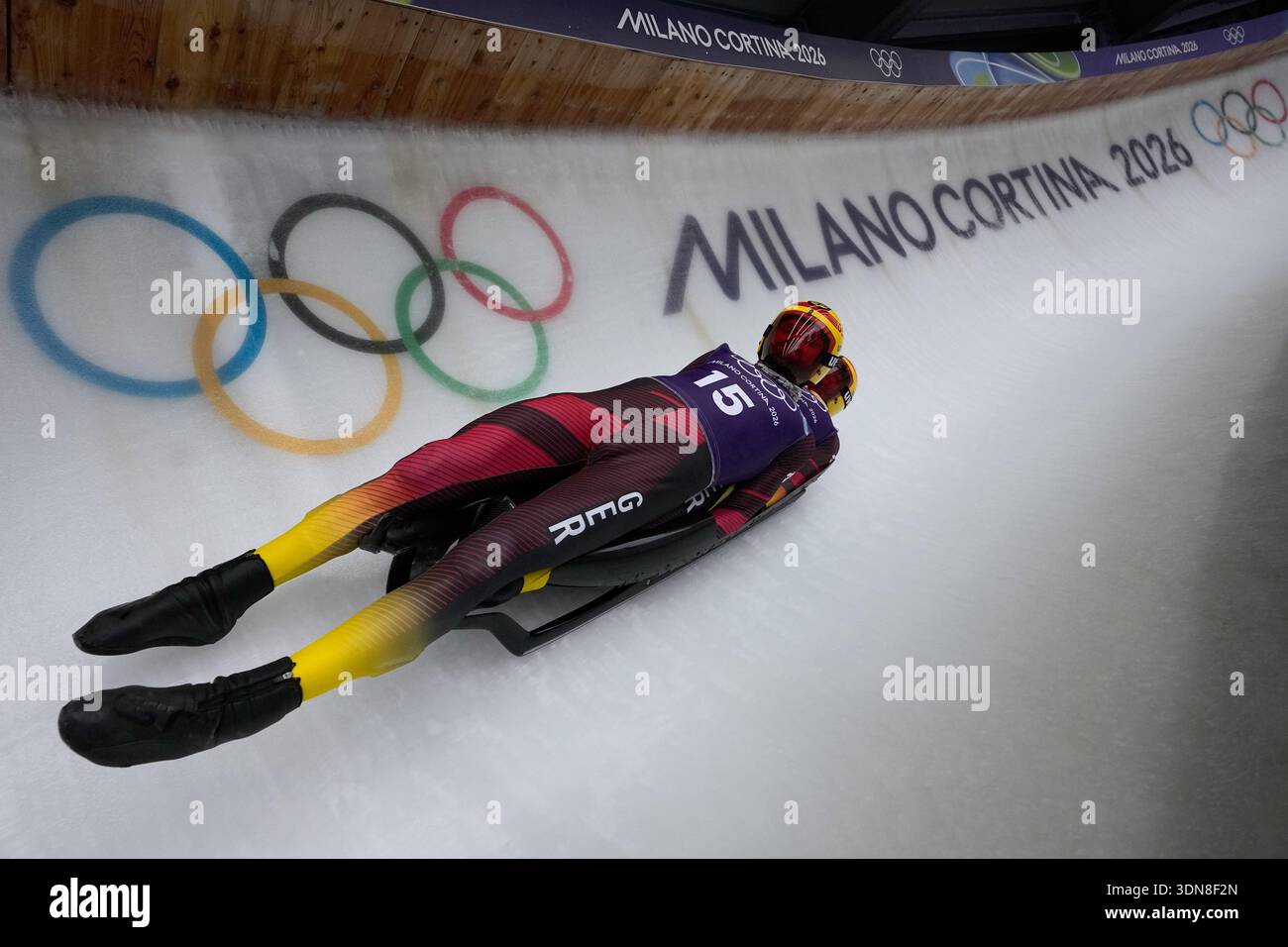 Germany's Toni Eggert, left, and Florian Mueller, right, slide down the ...