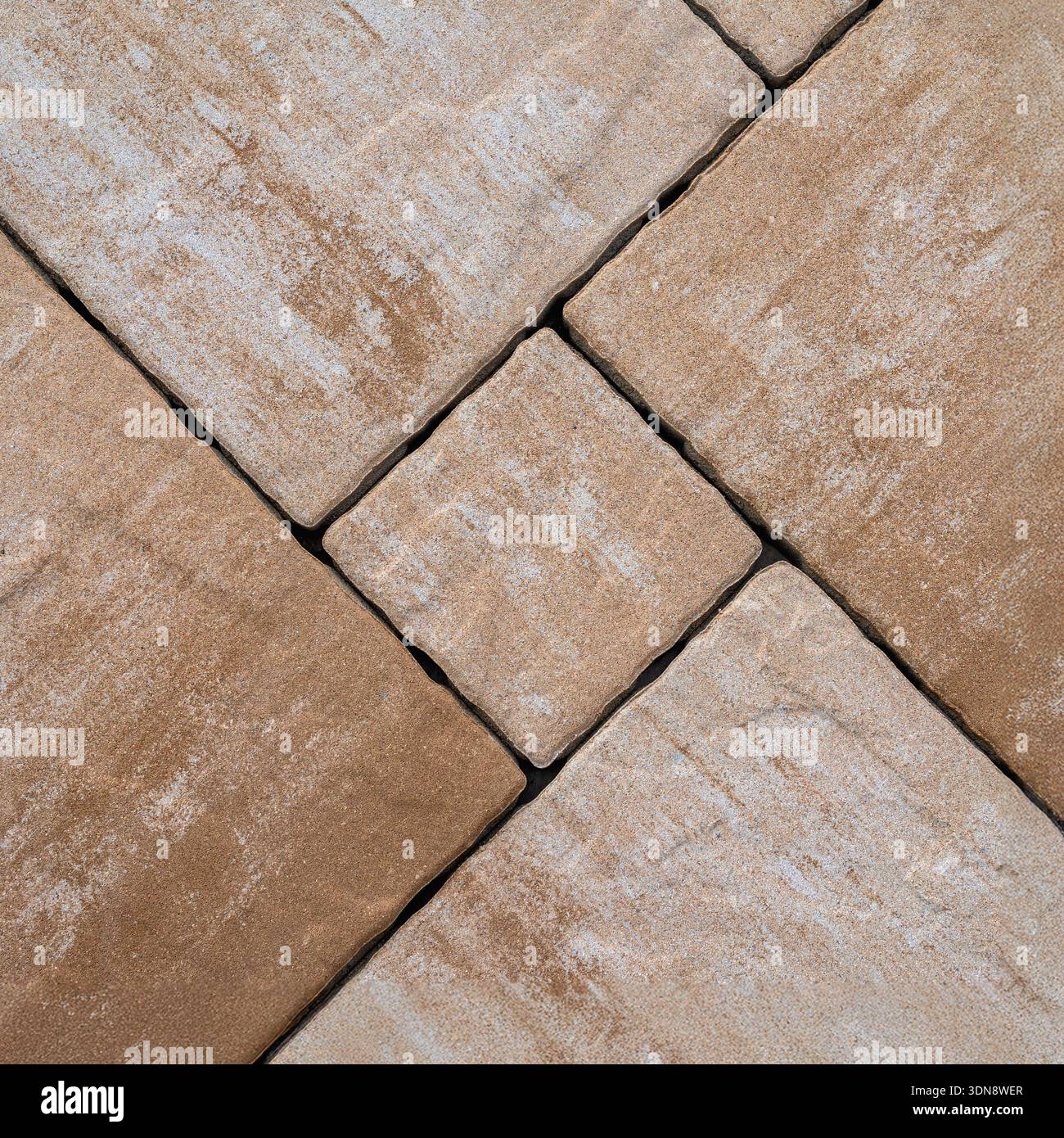 Top view of beige paving tiles with rough matte texture, pattern layout ...