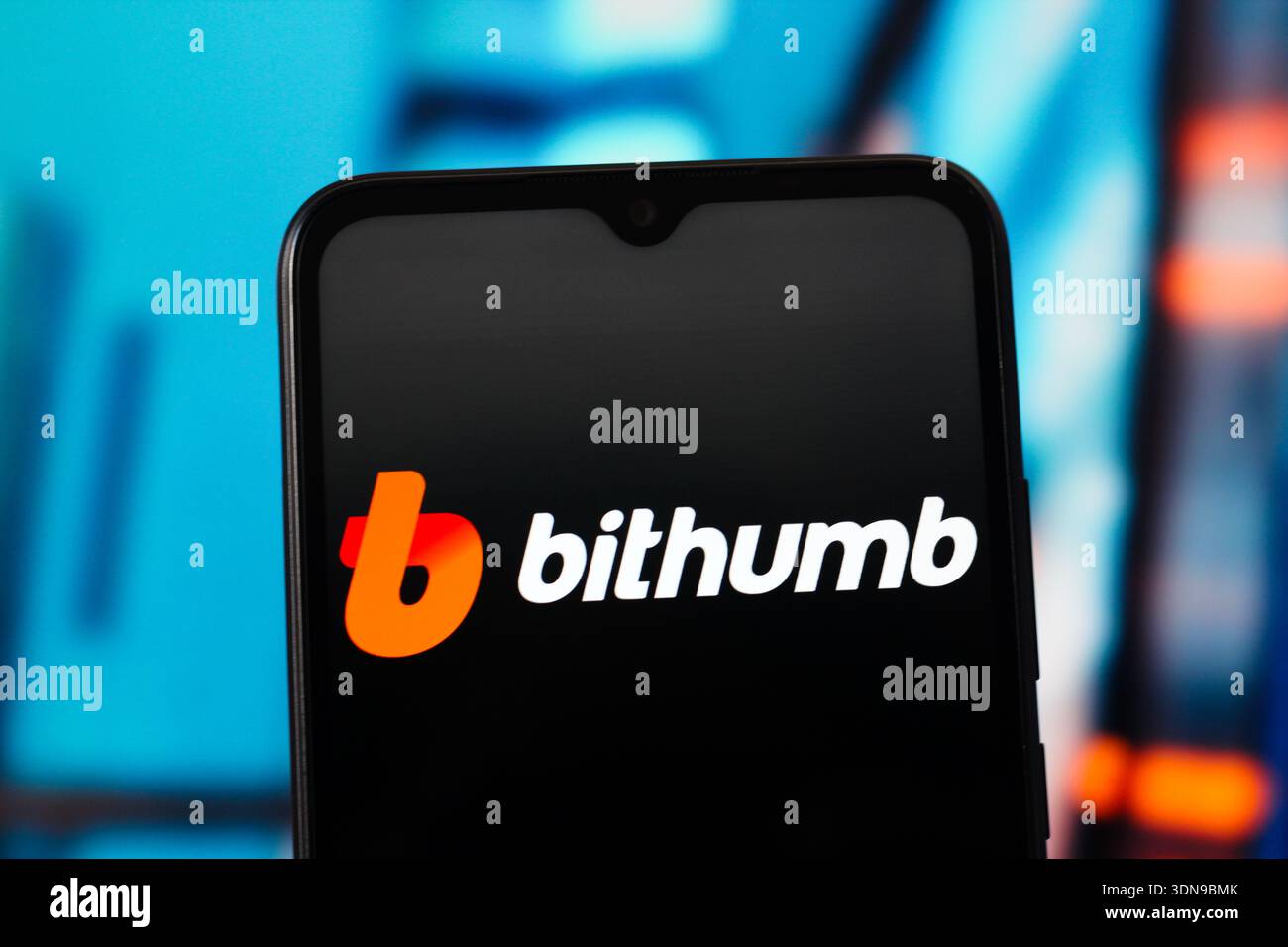 In this photo illustration, the Bithumb (Bit Humb) logo is seen ...