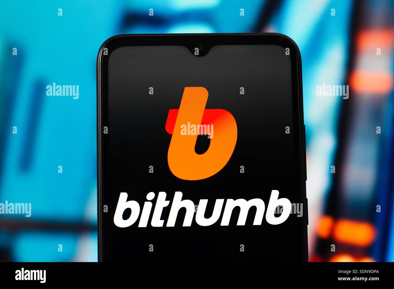In this photo illustration, the Bithumb (Bit Humb) logo is seen ...