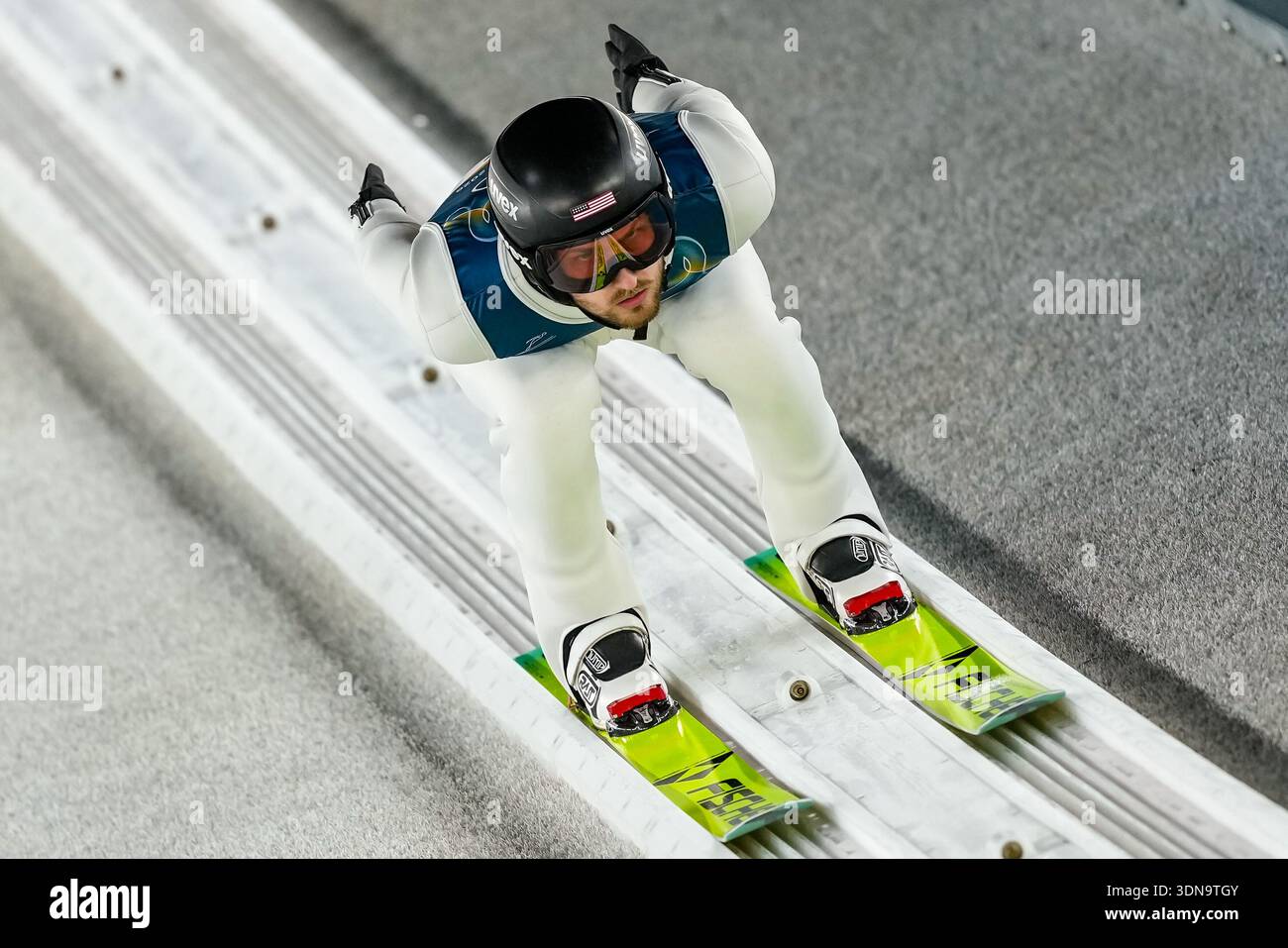 Kevin Bickner, of the United States, goes down the ramp during his ...