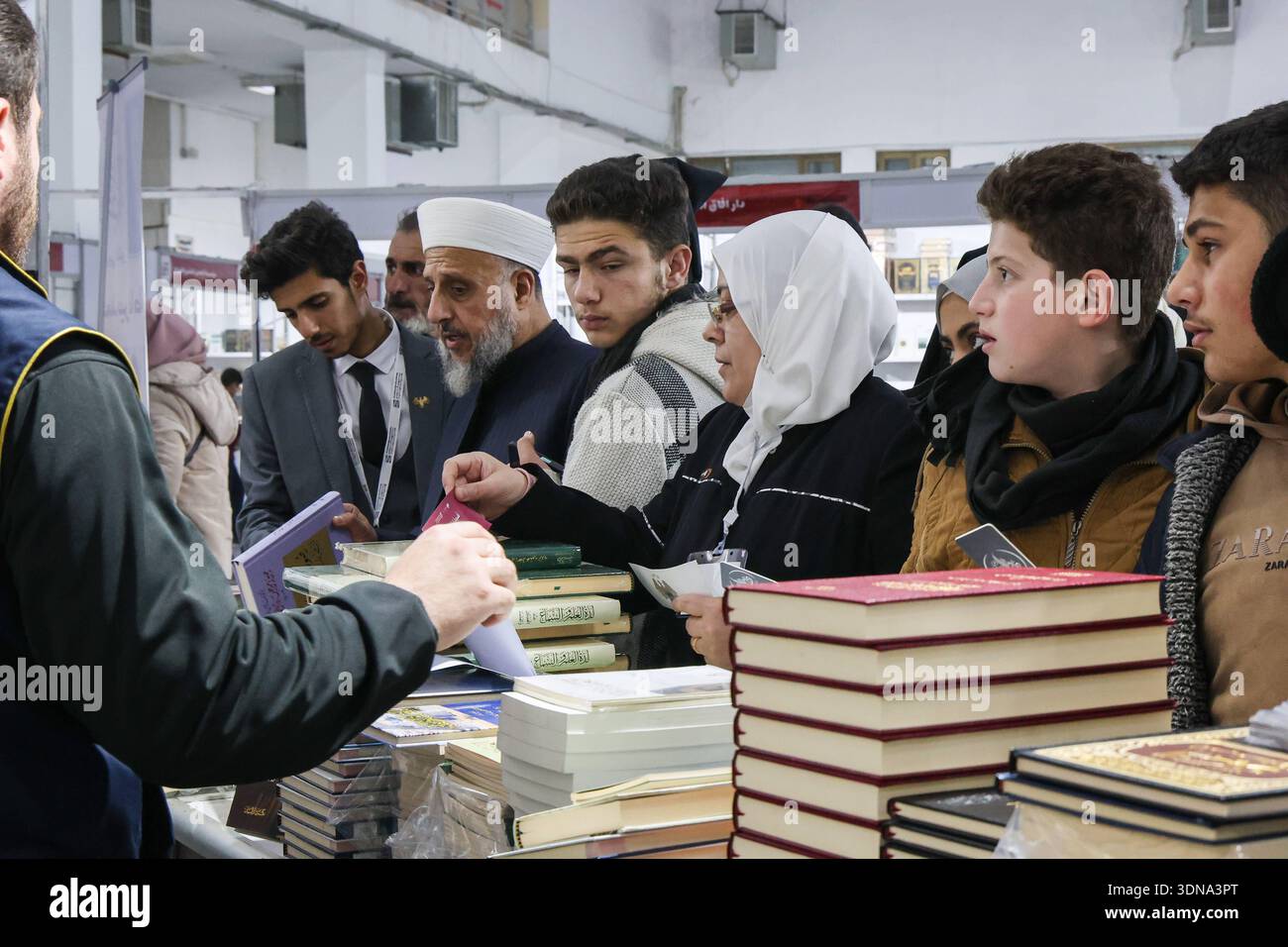 Thousands visit Damascus International Book Fair after regime fall. In ...