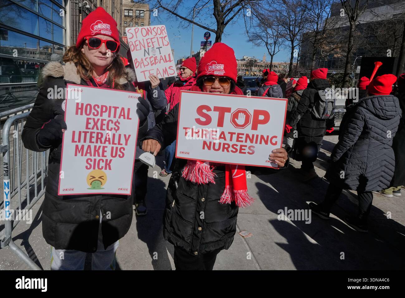 Striking nurses walk a picket line outside NewYork Presbyterian ...