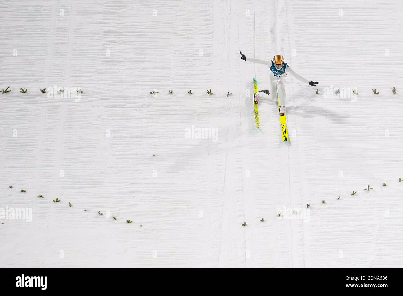 Jason Colby, of the United States, lands his final round jump during ...