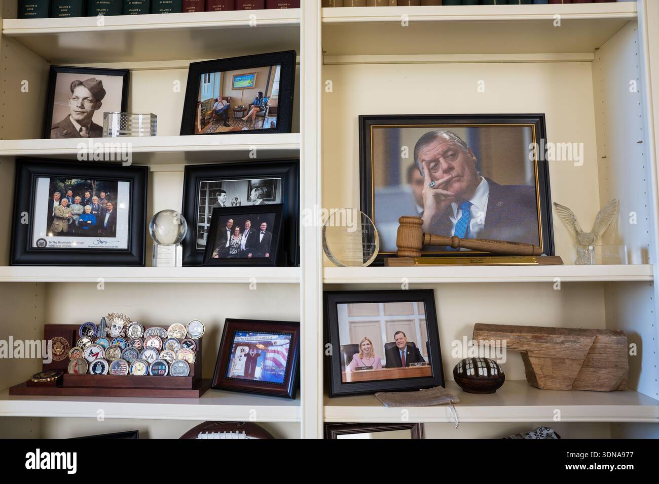 Photographs and personal items are seen in the office of House ...