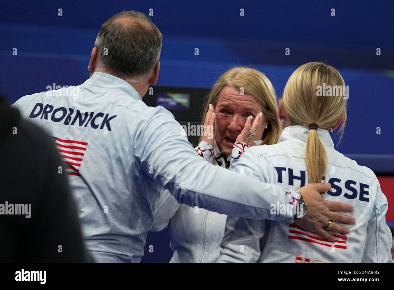 Coach Cathy Overton Clapham, center, reacts after the team won the semi ...