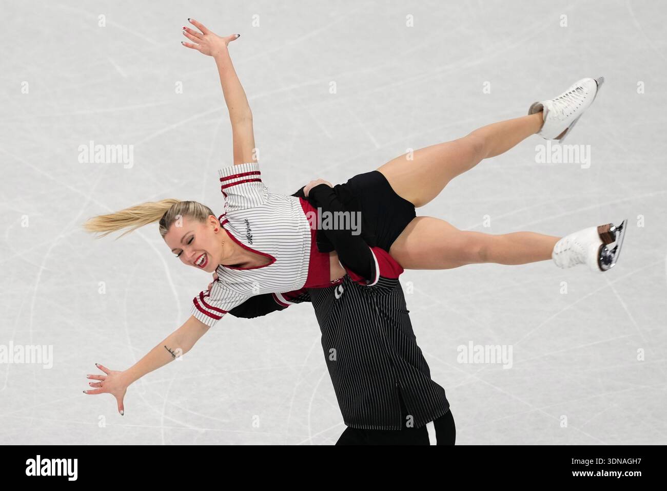 Marjorie Lajoie and Zachary Lagha of Canada compete during the rhythm ...