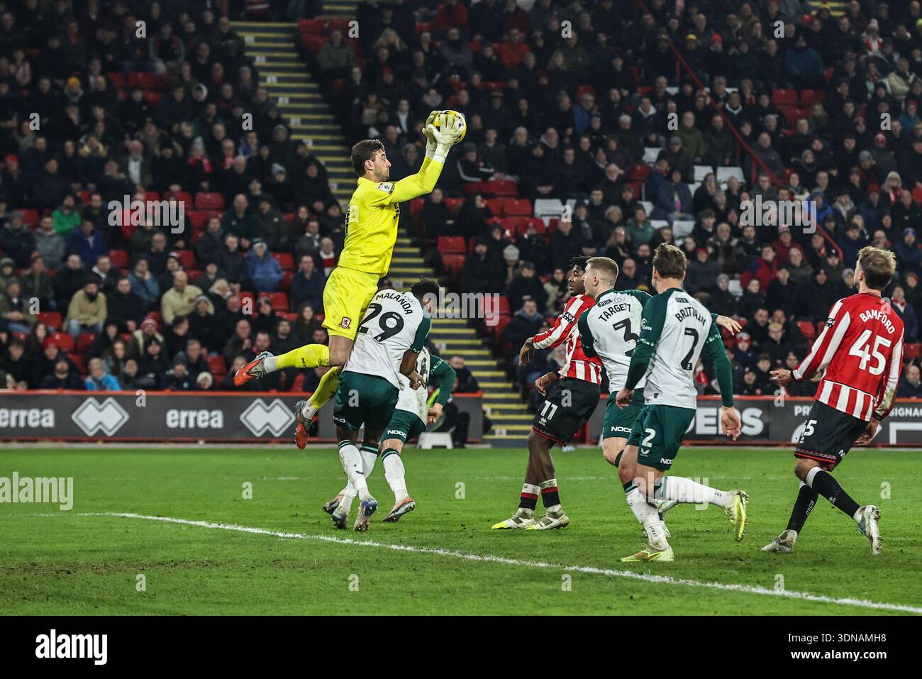 Middlesbrough goalkeeper Sol Brynn jumps up to win the high ball during ...