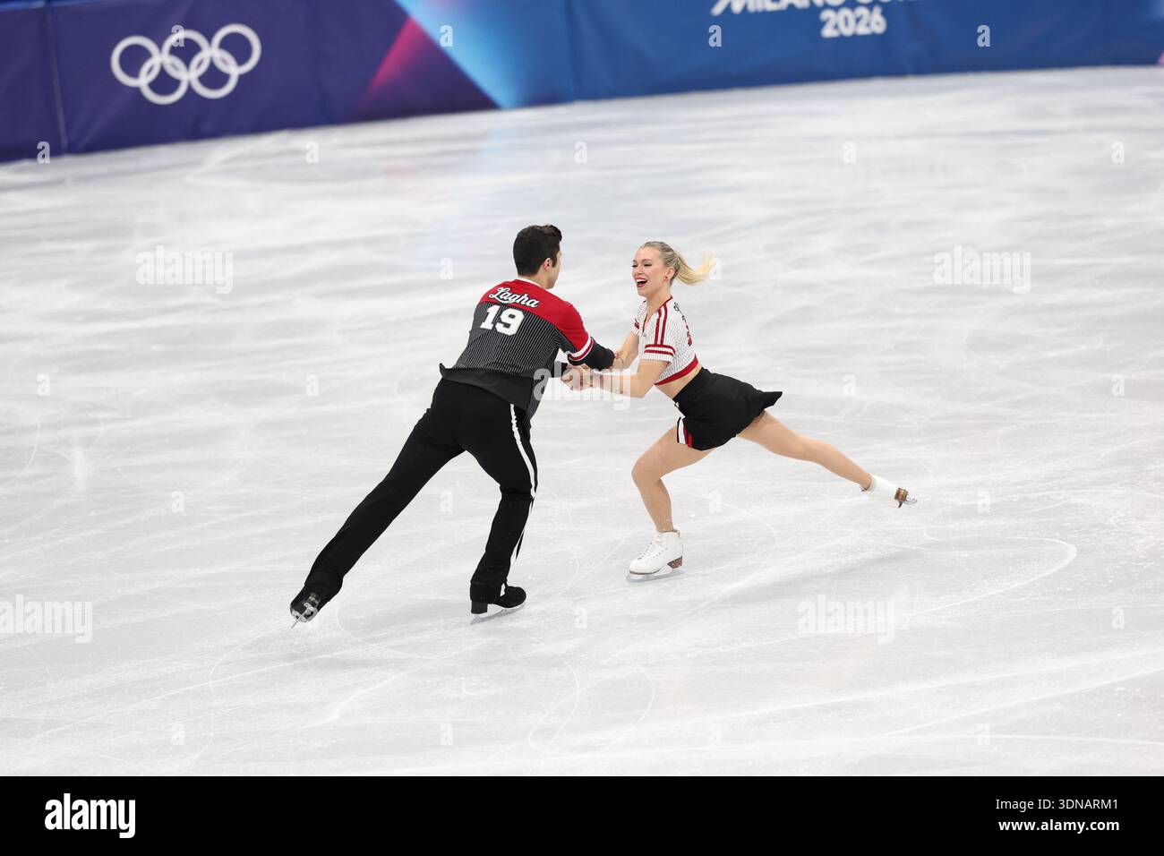 Marjorie Lajoie and Zachary Lagha of Team Canada compete in the figure ...