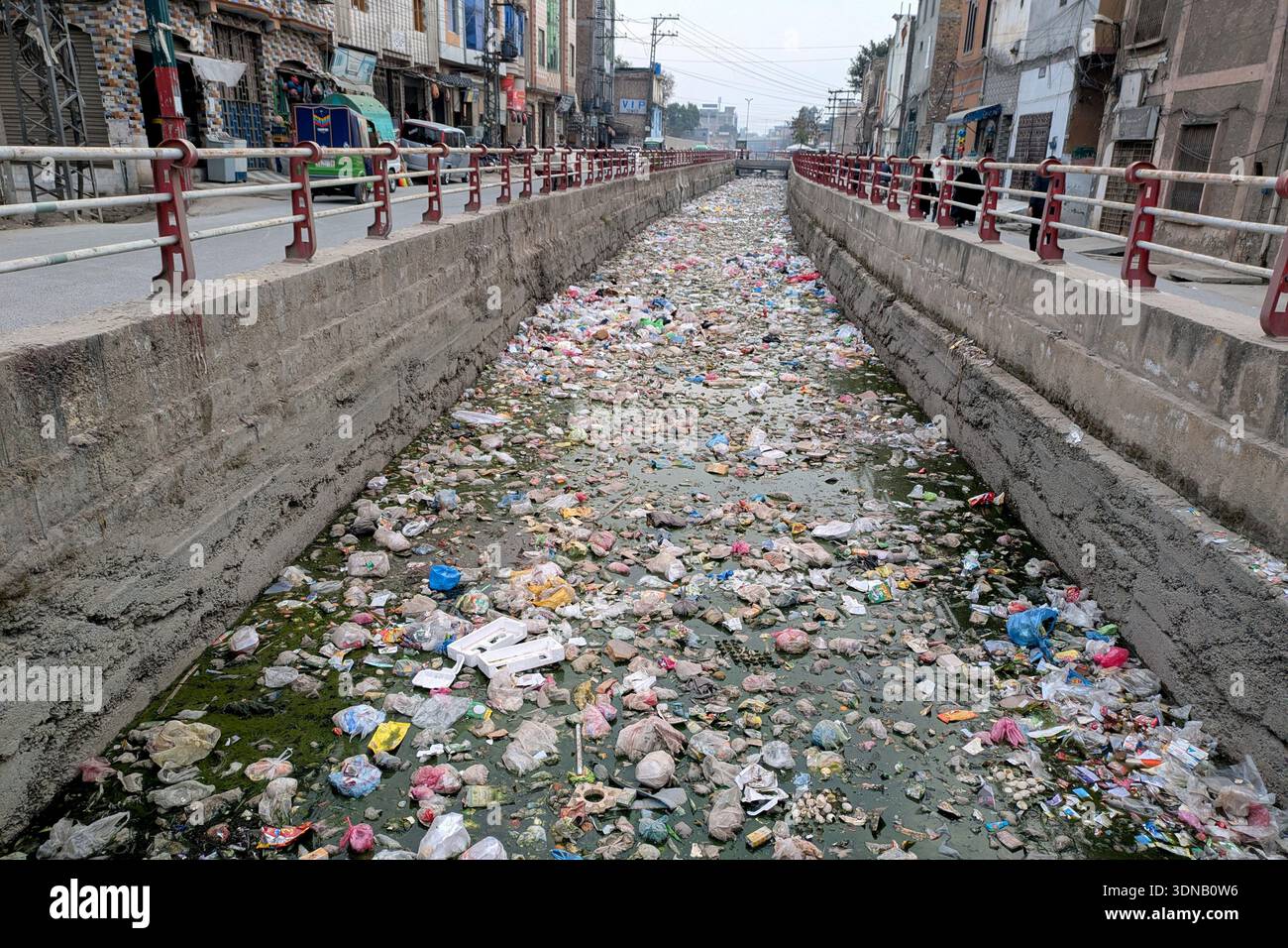 Peshawar, Peshawar, Pakistan. 9th Feb, 2026. Garbage clogs canal in ...