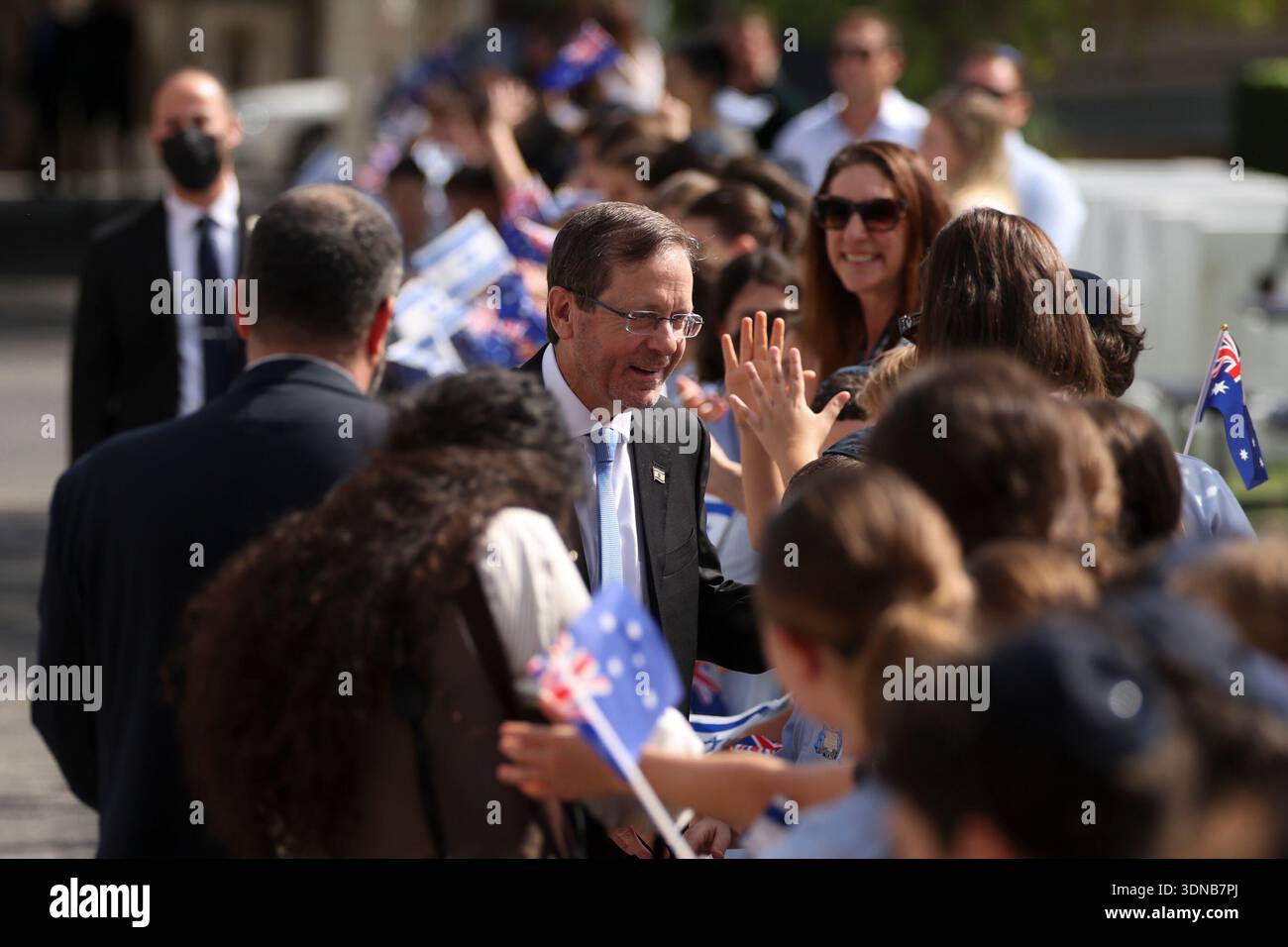 Israeli President Isaac Herzog, center, meets students at Moriah War ...