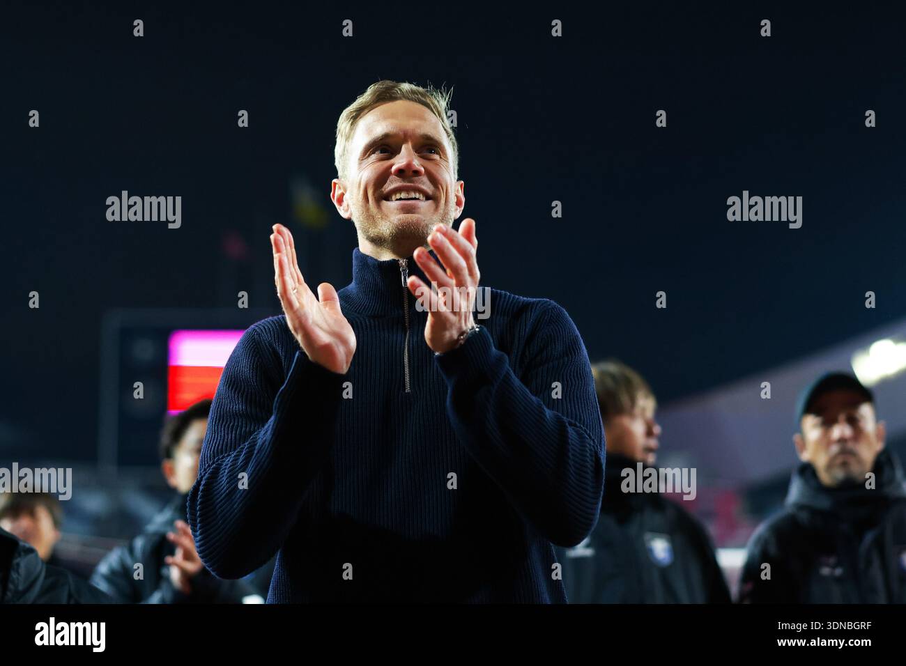 Gamba Osaka head coach Jens Wissing acknowledges fans after the J1 100 ...