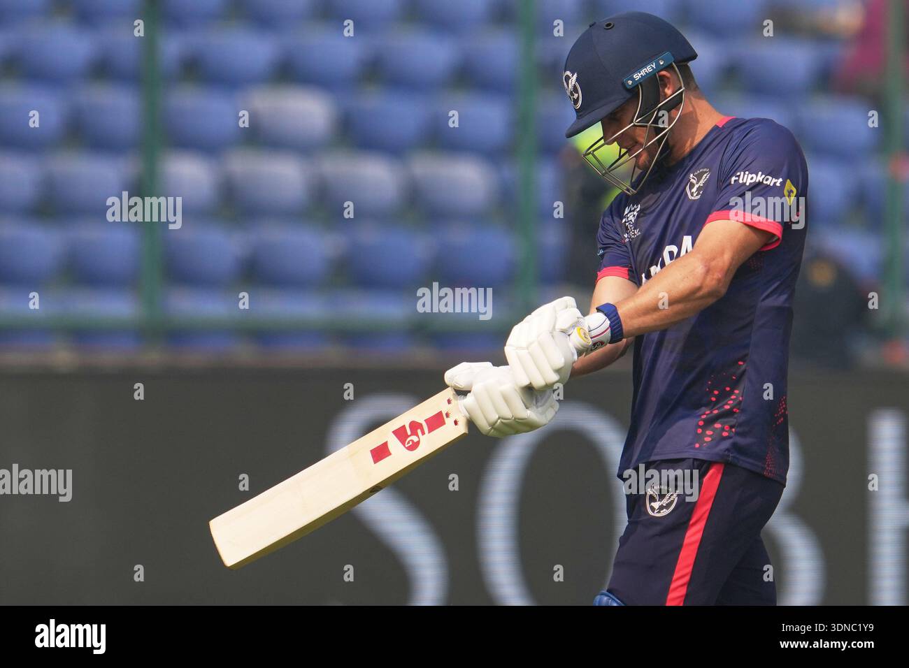 Namibia's captain Gerhard Erasmus leaves the ground after his dismissal ...