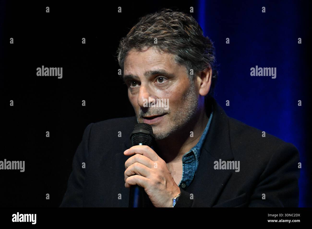Pascal Elbé attending a solidarity meeting with the Iranian people at ...
