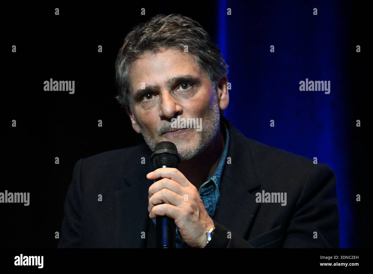 Pascal Elbé attending a solidarity meeting with the Iranian people at ...