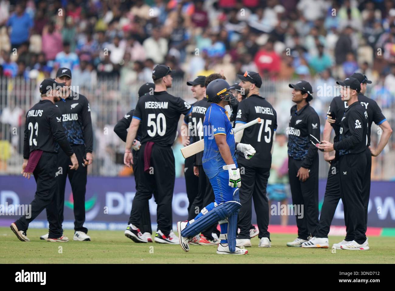 United Arab Emirates' Alishan Sharafu leaves the ground after losing ...