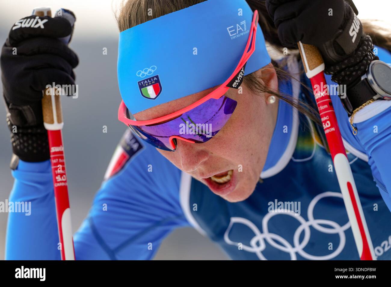 Caterina Ganz, of Italy, reacts after crossing the finish line in a ...