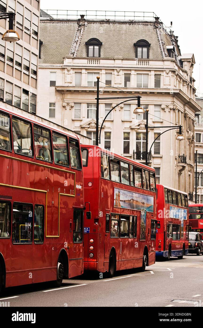 Iconic london scene with red buses hi-res stock photography and images ...