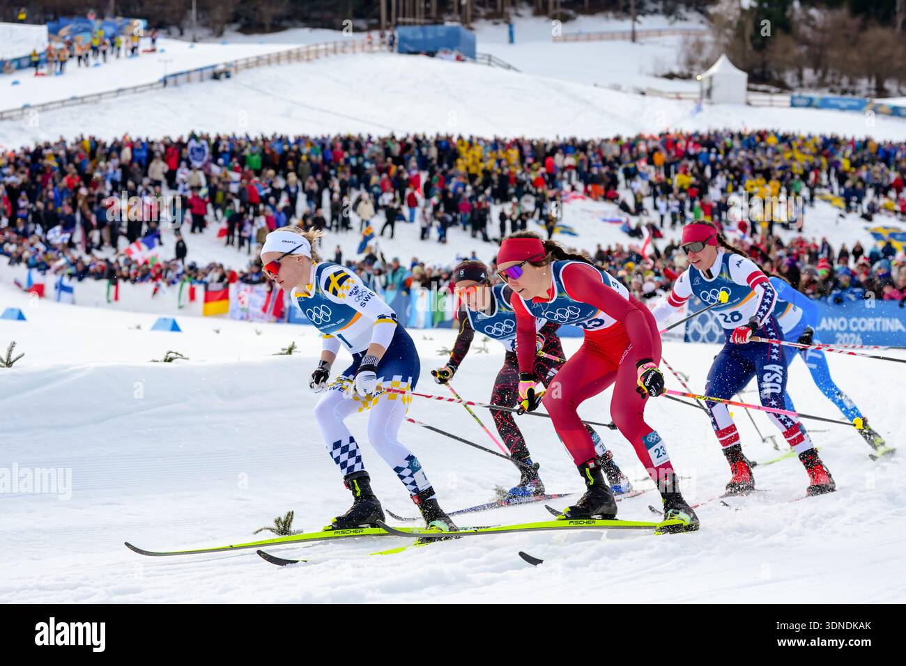 Linn Svahn, of Sweden, left, leads during a quarterfinal of the cross ...