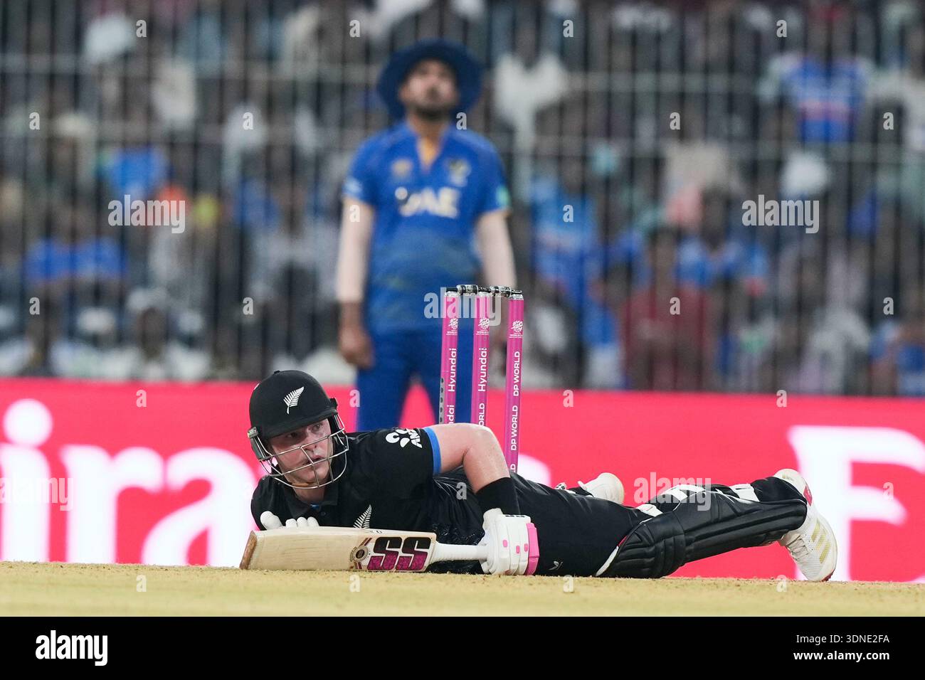 New Zealand's Tim Seifert loose his balance while playing a shot during ...