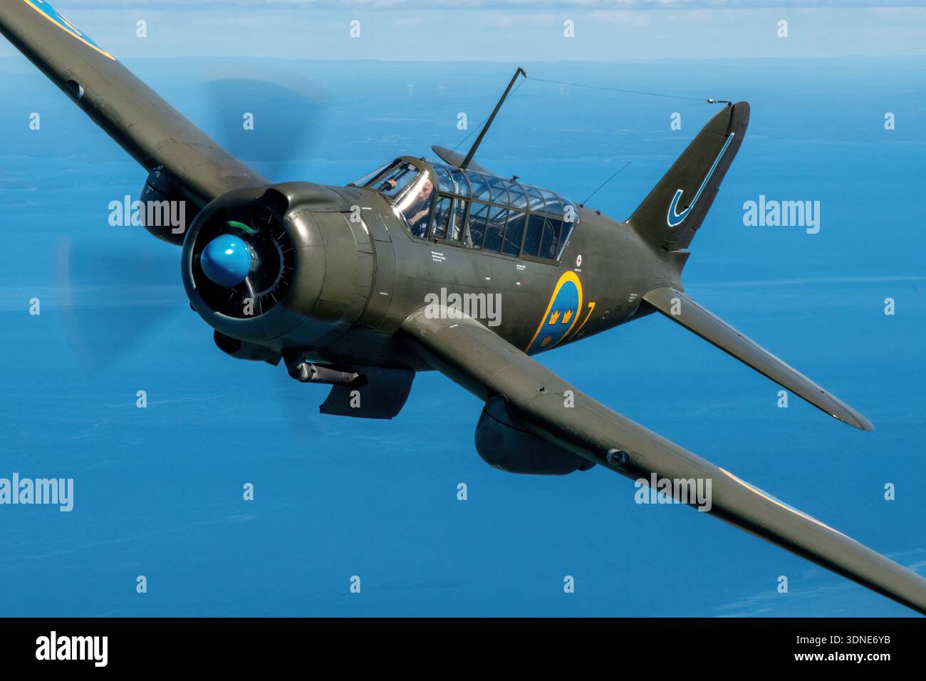 The Saab B17A in this air‑to‑air banking shot features a close‑up view ...