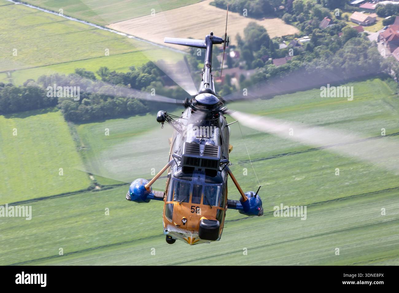 Captured in air-to-air flight, this German Navy Westland WS-61 Sea King ...