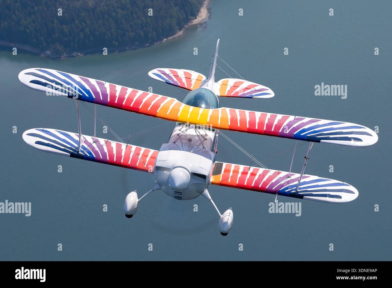 The Christen Eagle II, registration OH-XHN, is captured in flight at ...