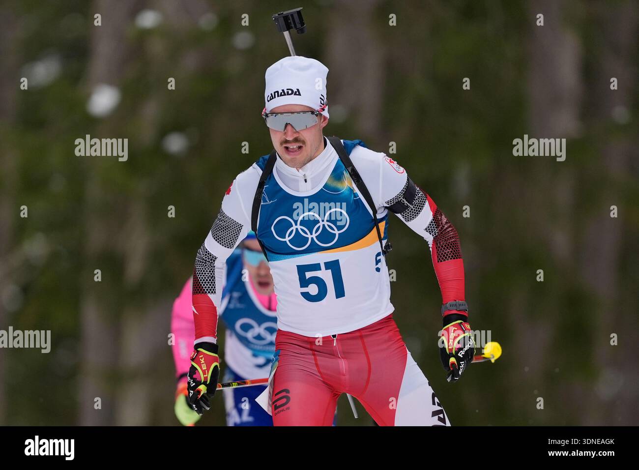 Adam Runnalls, of Canada, competes in the men's 20-kilometer individual ...